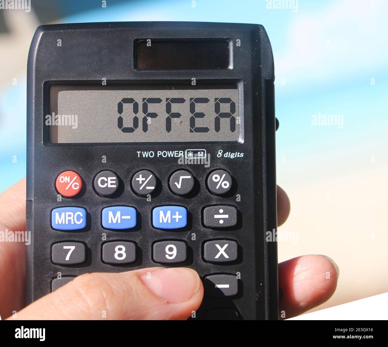 Calculator text OFFER on display. Tourism business concept Stock Photo ...