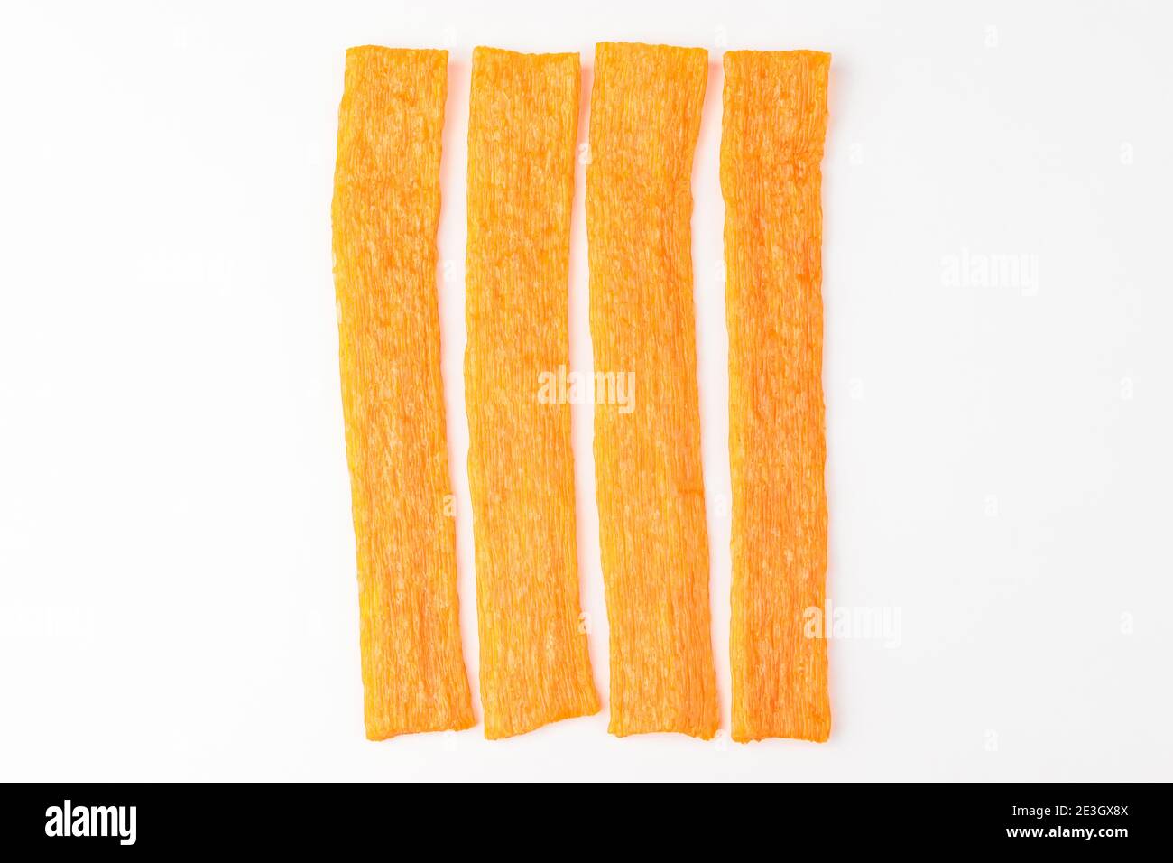 Sticky snack on white background Stock Photo - Alamy