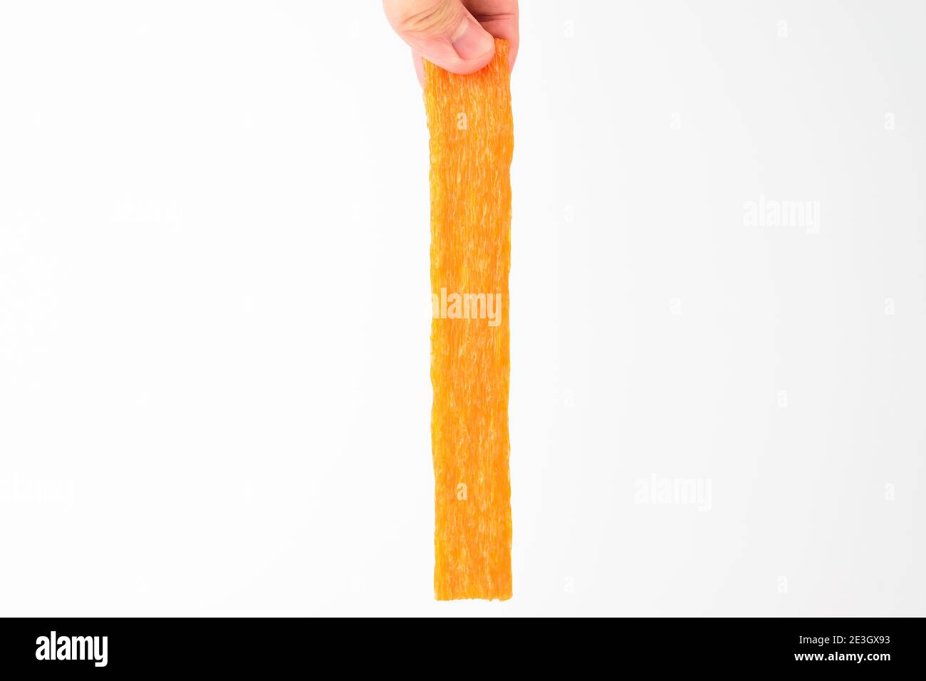 Sticky snack on white background Stock Photo - Alamy