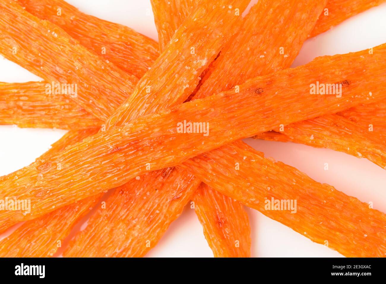 Sticky snack on white background Stock Photo - Alamy