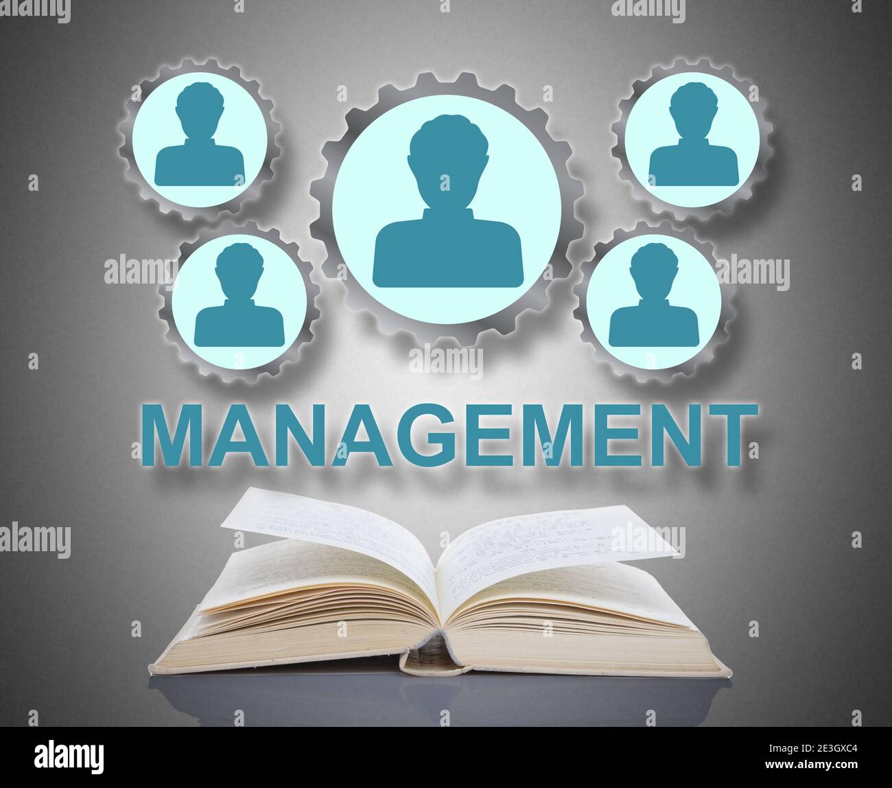 Management concept above an open book Stock Photo - Alamy