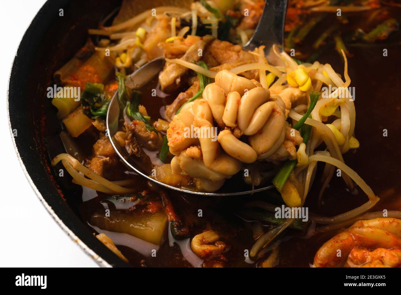 Cooking fish broth on a white background Stock Photo - Alamy