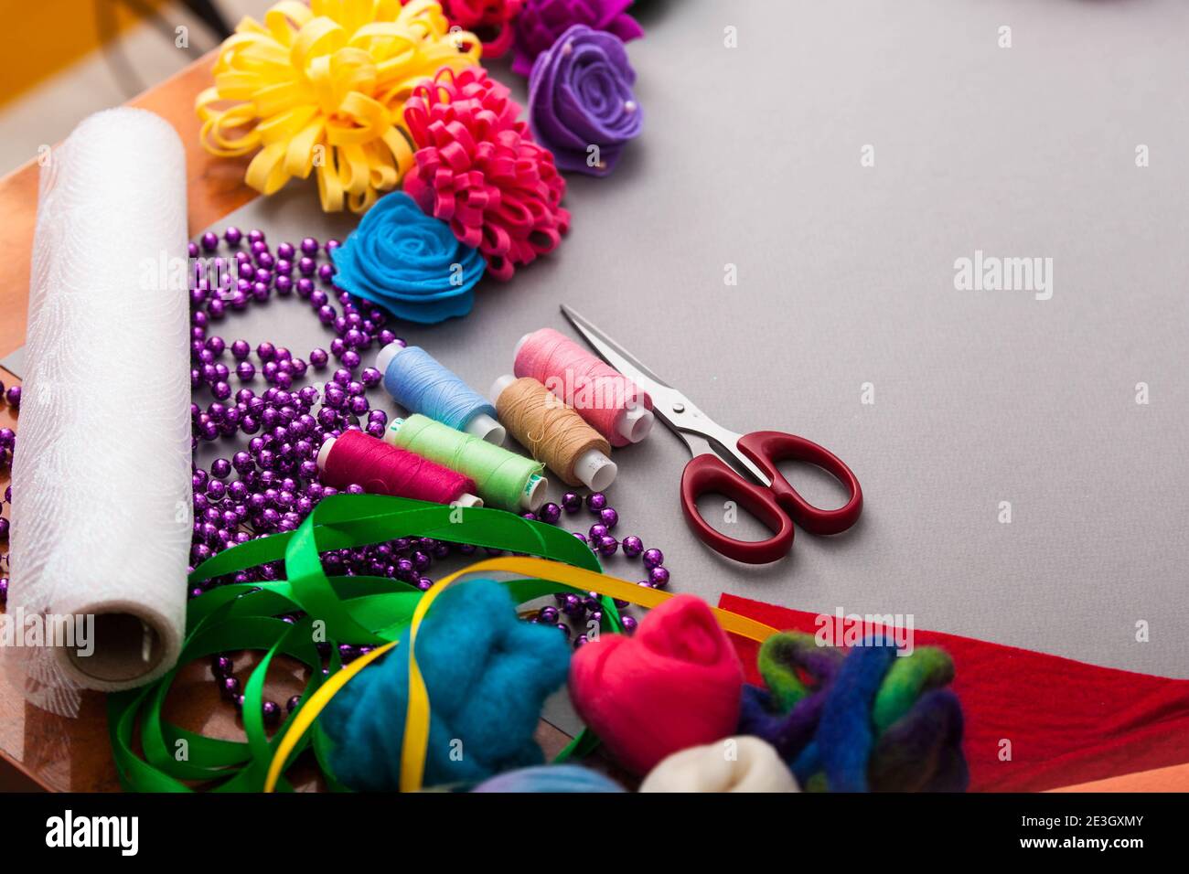 Woman modelling artificial flower from clay Stock Photo - Alamy