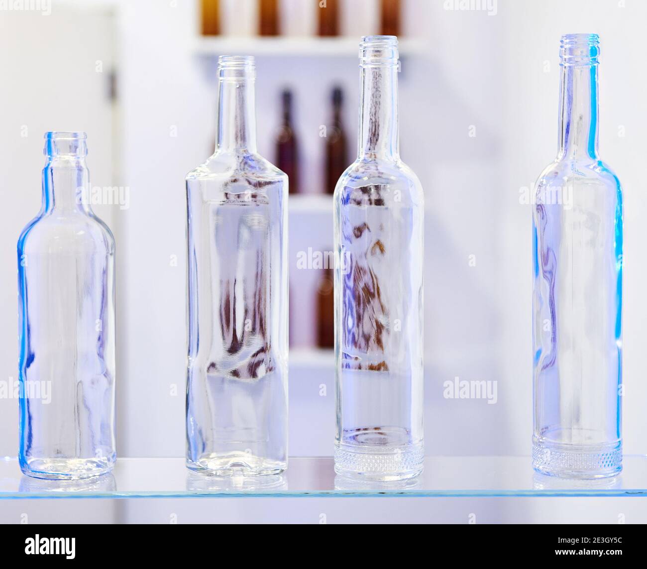 Empty bottles for alcoholic drinks at a shop window Stock Photo - Alamy