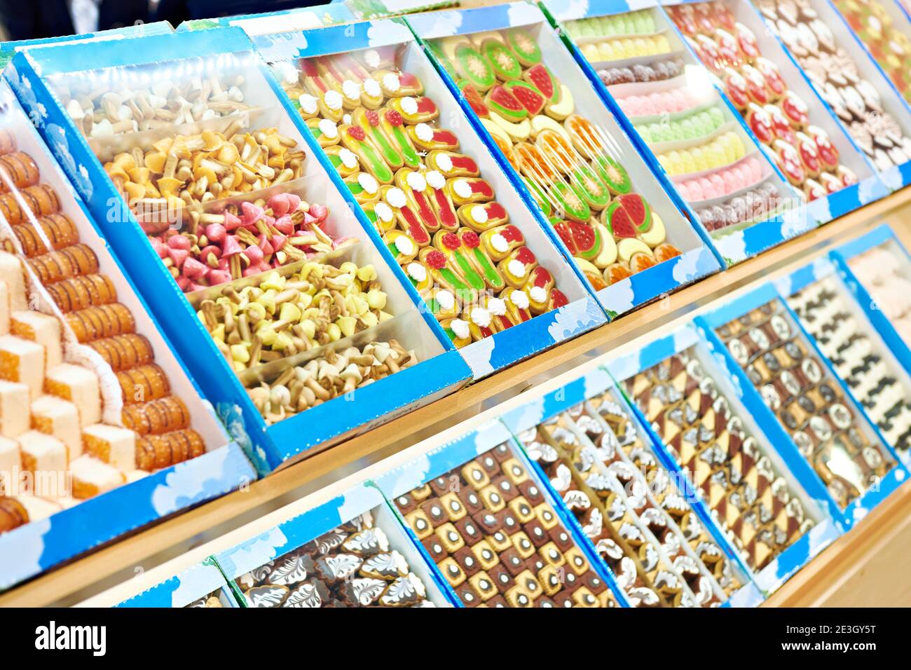 Confectionery, biscuits and sweets on the shelf Stock Photo - Alamy