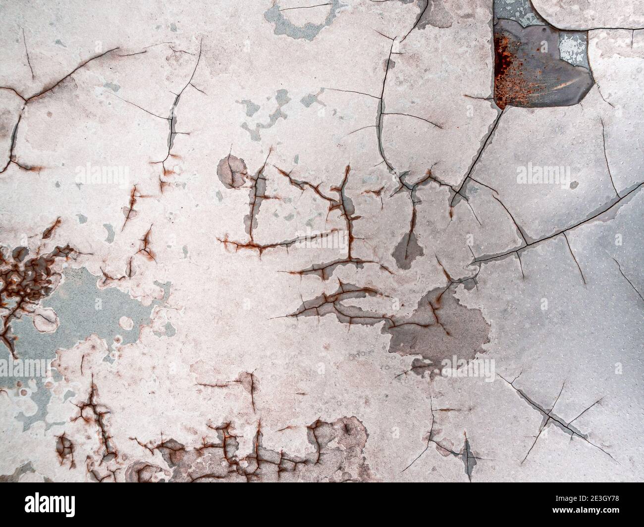 Worn rusty metal surface with paint flaking and cracking texture ...