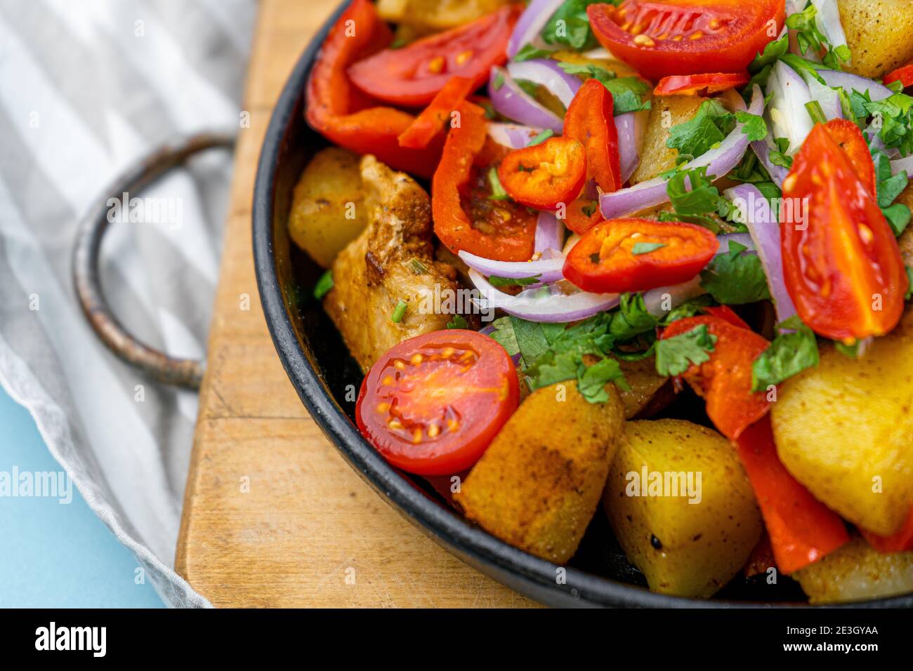 Pork ojakhuri with vegetables. Meat, potatoes, onions, herbs, peppers ...