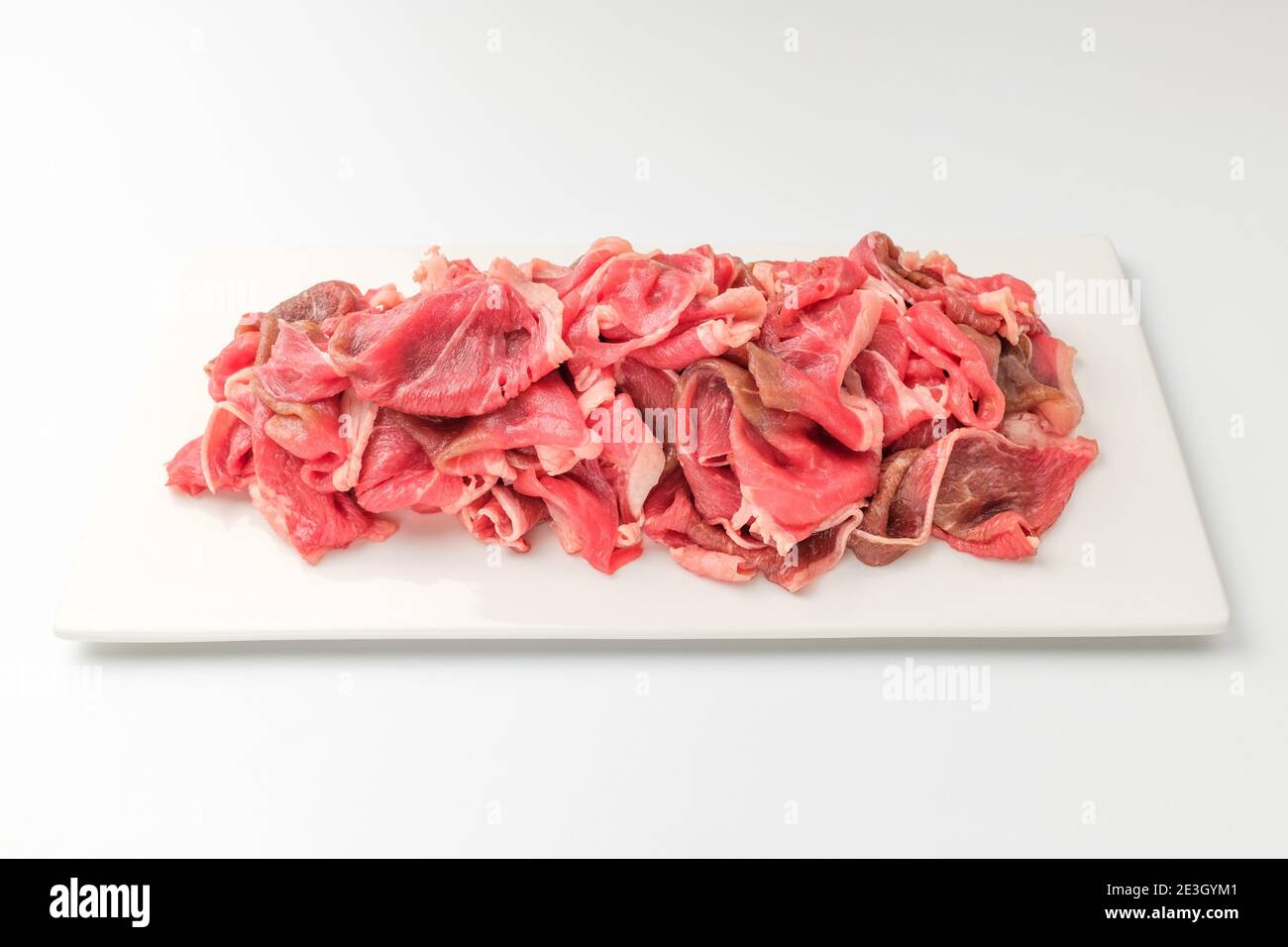 Beef front leg meat on white background Stock Photo - Alamy