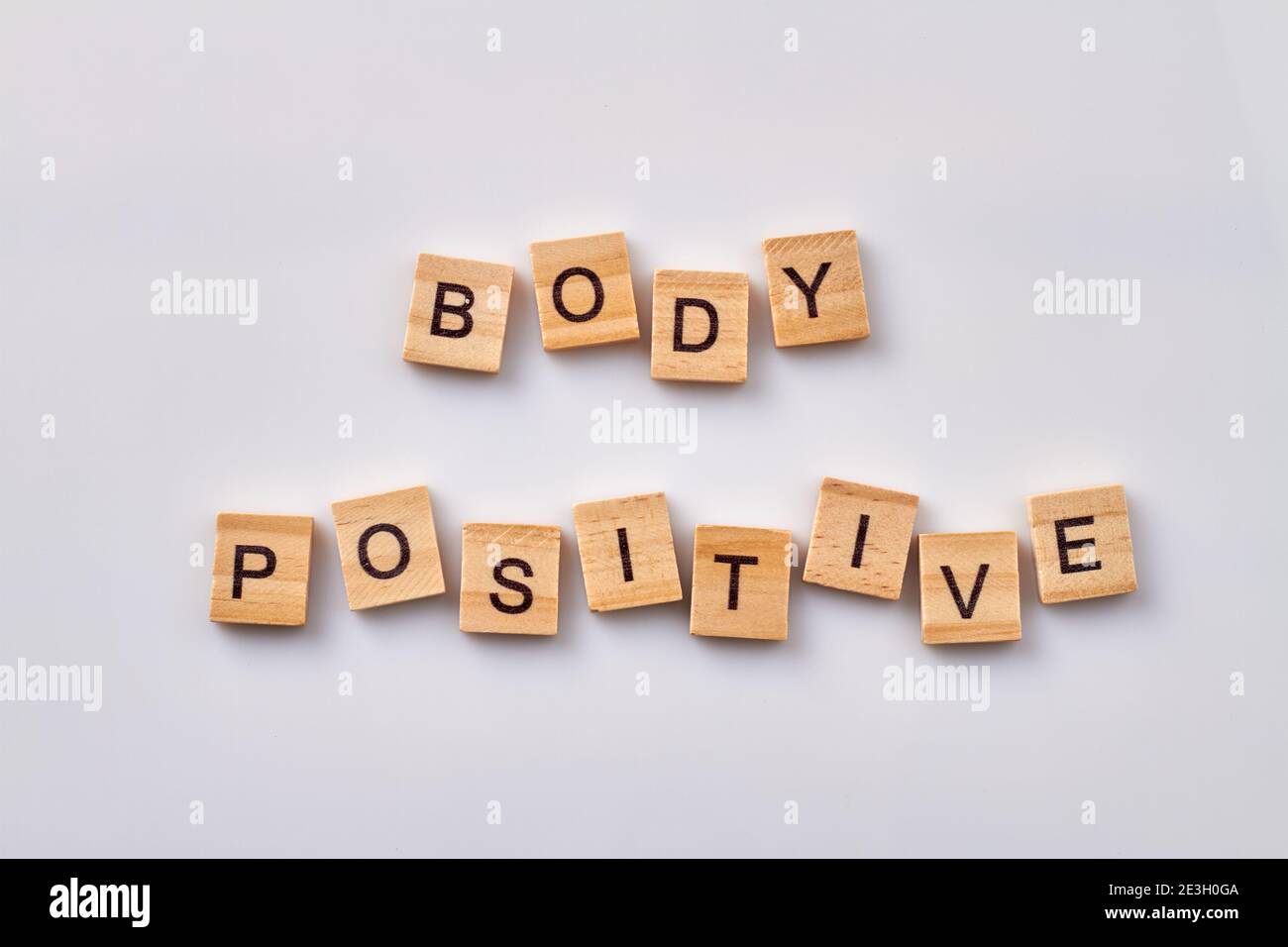 Body positive wooden cubes Stock Photo - Alamy