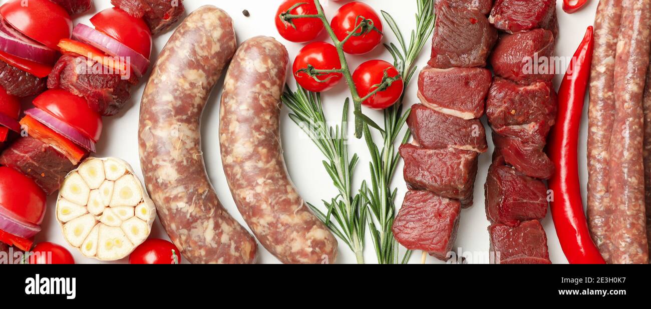 Set of different raw barbecue meat on white background, top view Stock ...