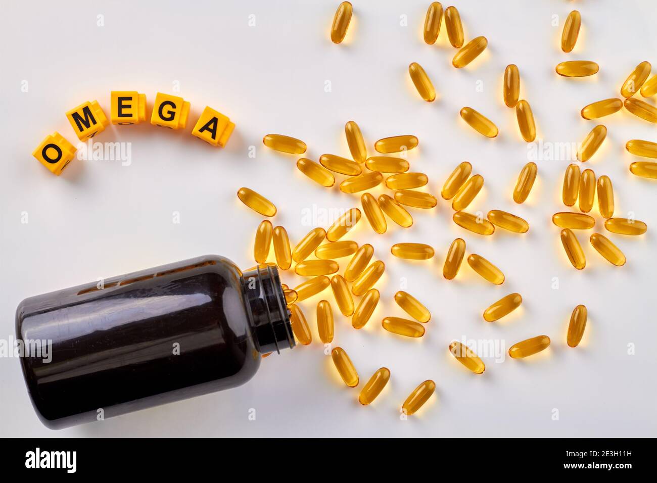 Omega pills bottle on white background Stock Photo - Alamy