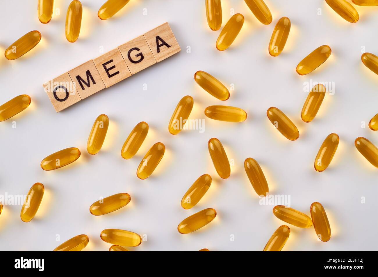 Omega word made of wooden blocks Stock Photo - Alamy