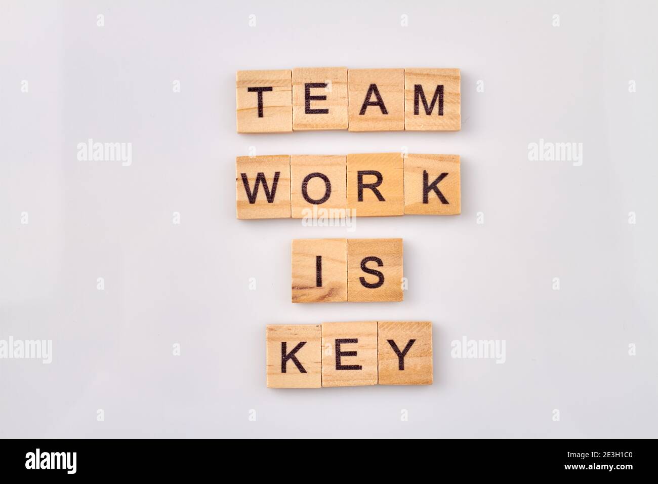 Team work words made with alphabet blocks Stock Photo - Alamy