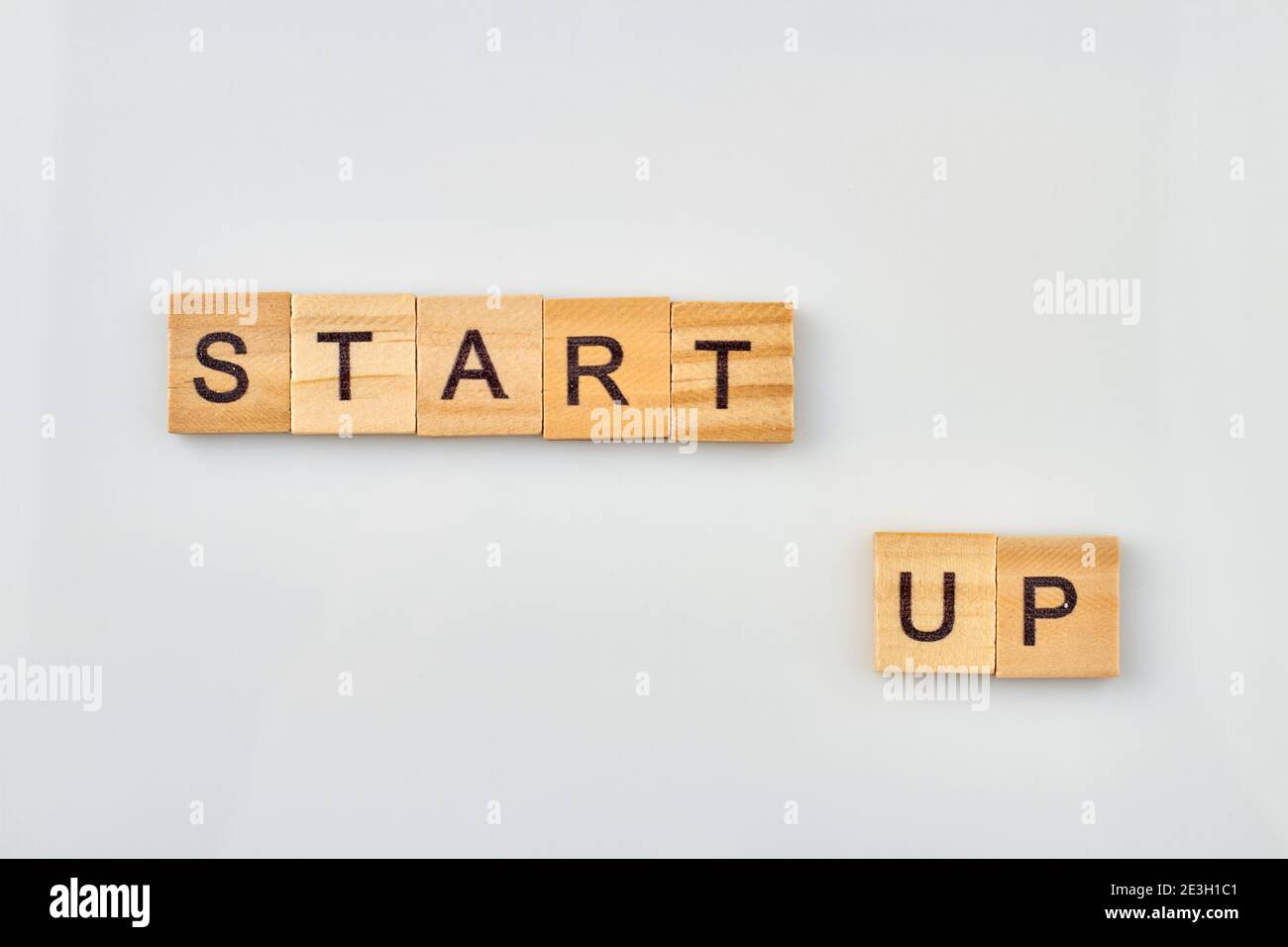 Concept word forming with cube on white background Stock Photo - Alamy