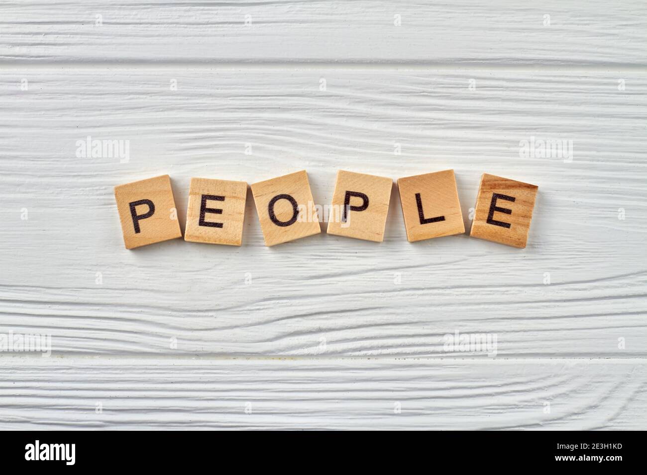 Word people written with wooden cubes Stock Photo - Alamy