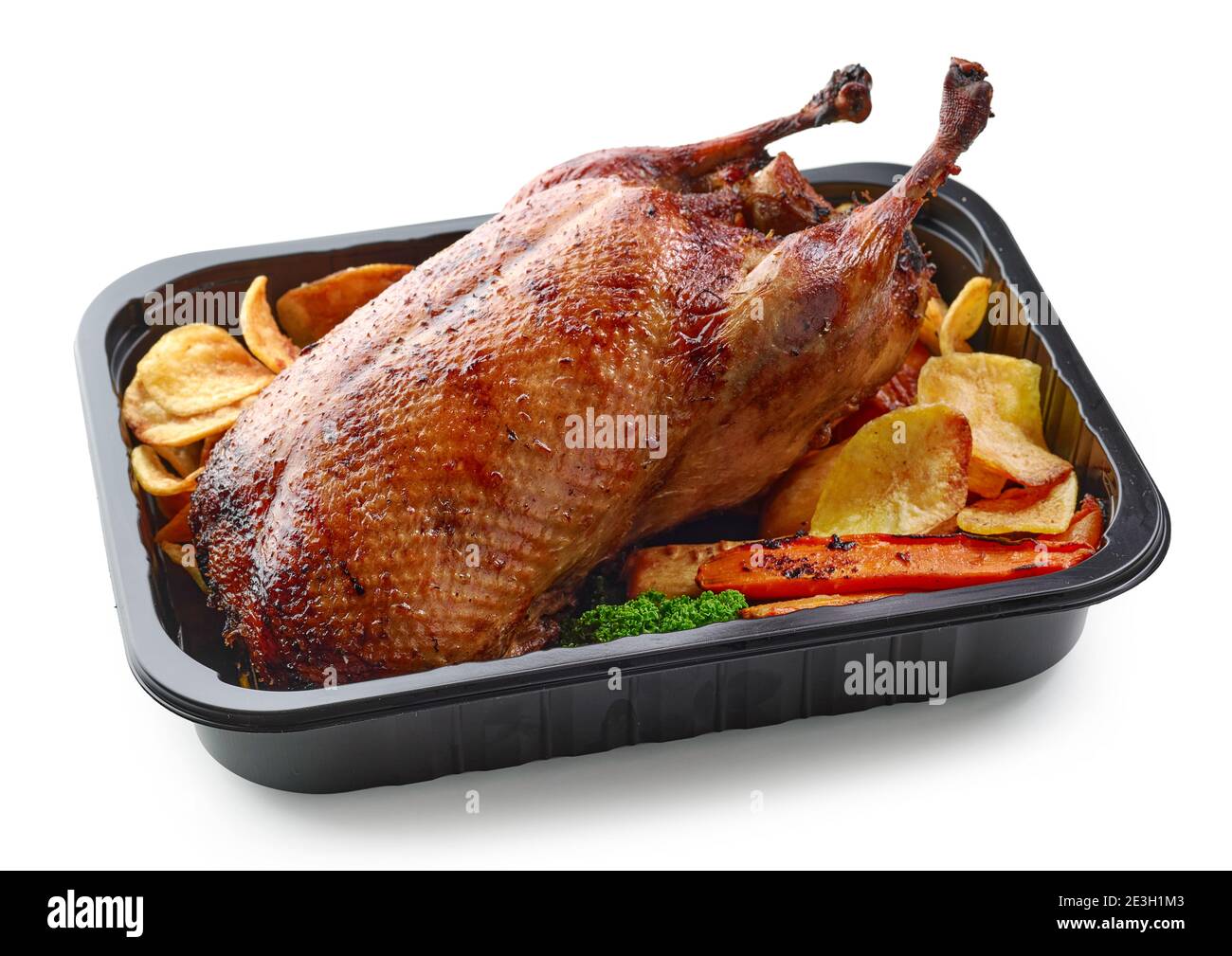 freshly roasted duck and vegetables in plastic container ready for ...