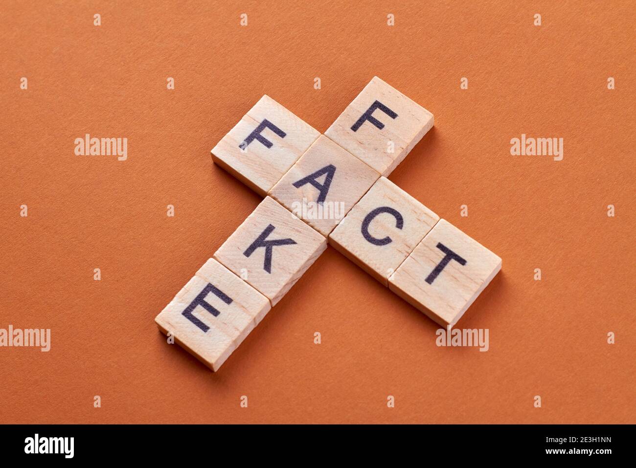Fact and fake word phrase by letters block Stock Photo - Alamy