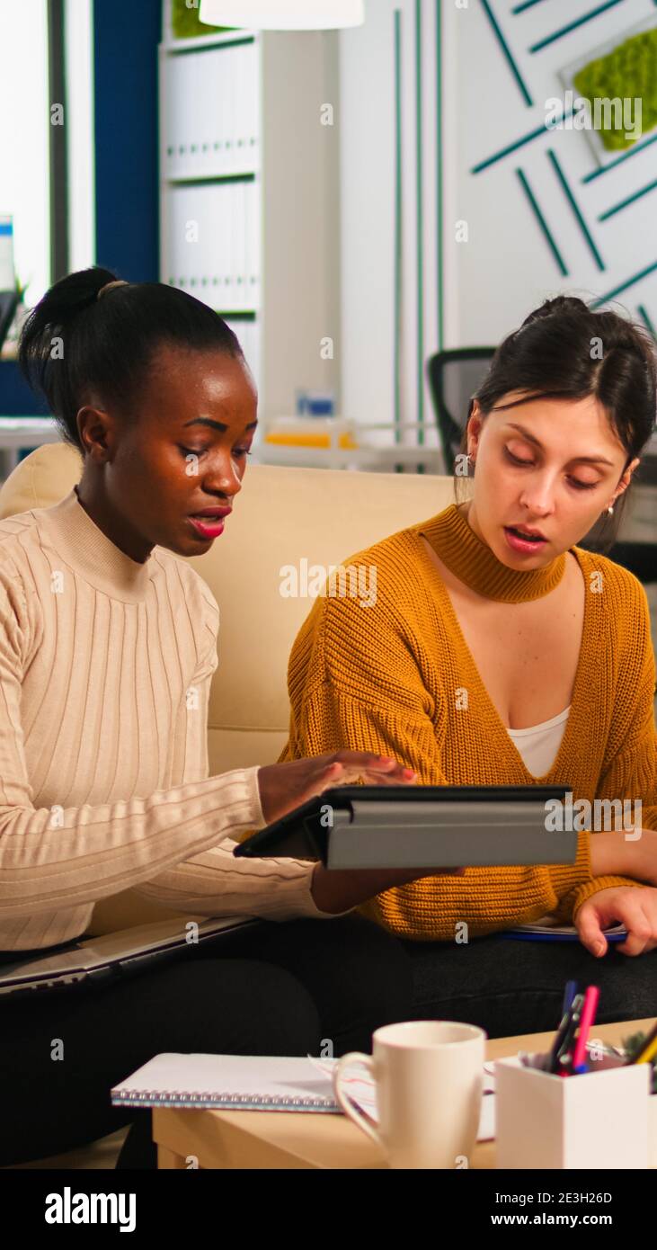 Diverse colleagues during business meeting with african american woman ...