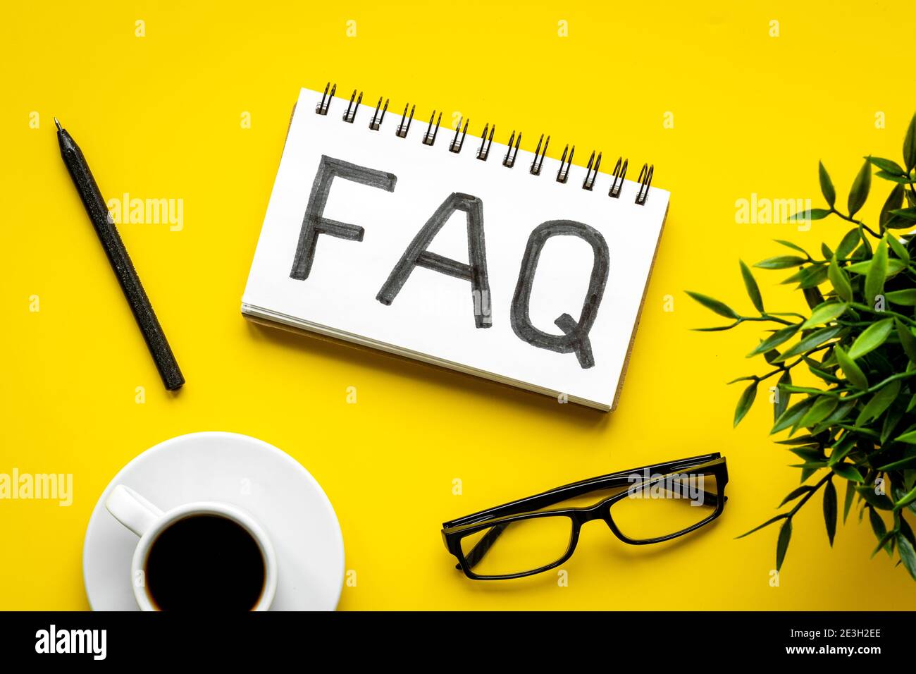 FAQ concept. Text on office table. Information Helpdesk Stock Photo - Alamy