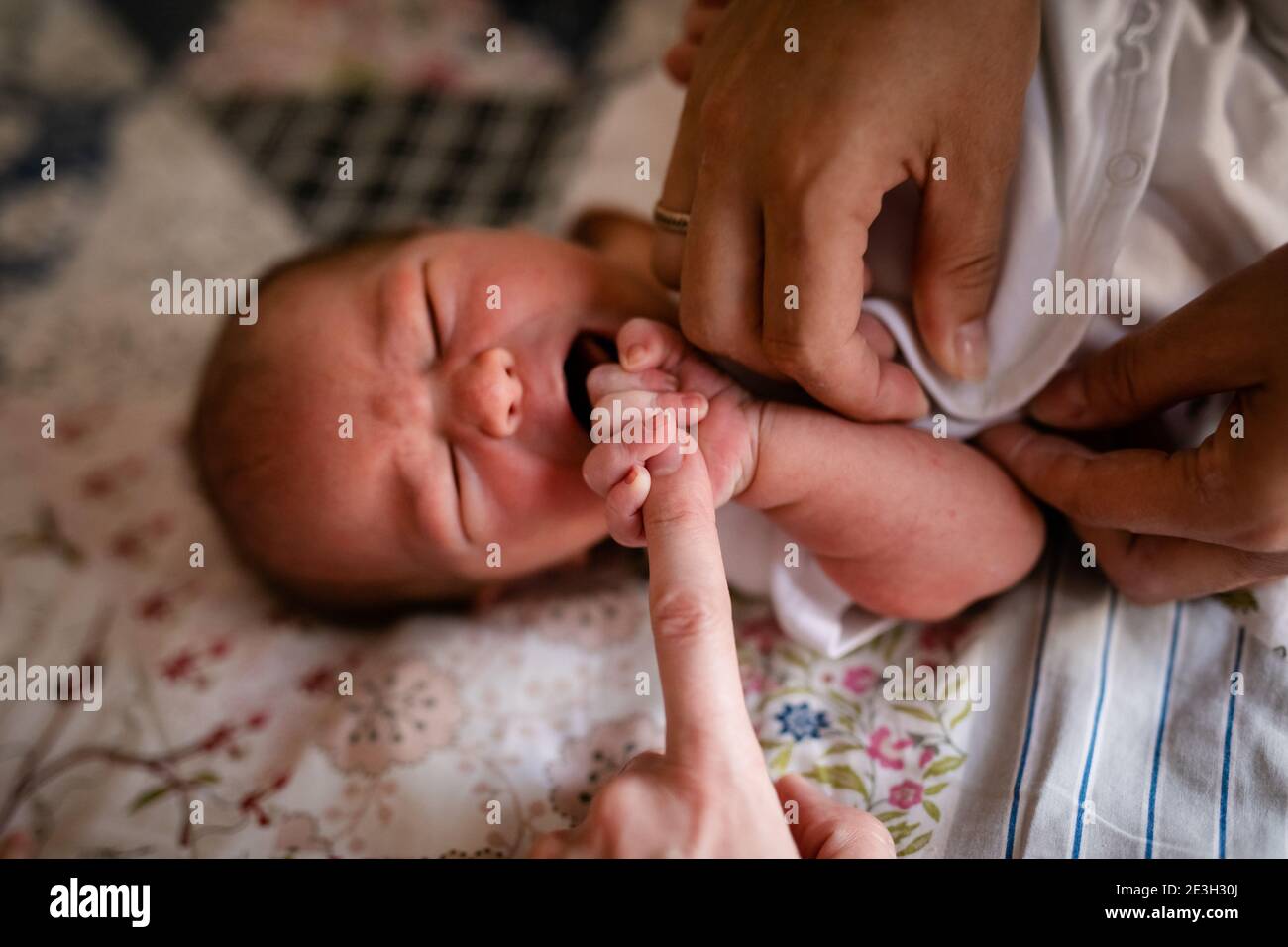 Child clinging to parent hi-res stock photography and images - Alamy