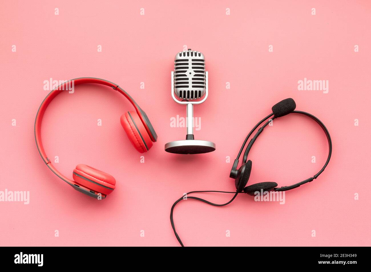 Podcast and streaming record. Microphone and headphones on table, top ...