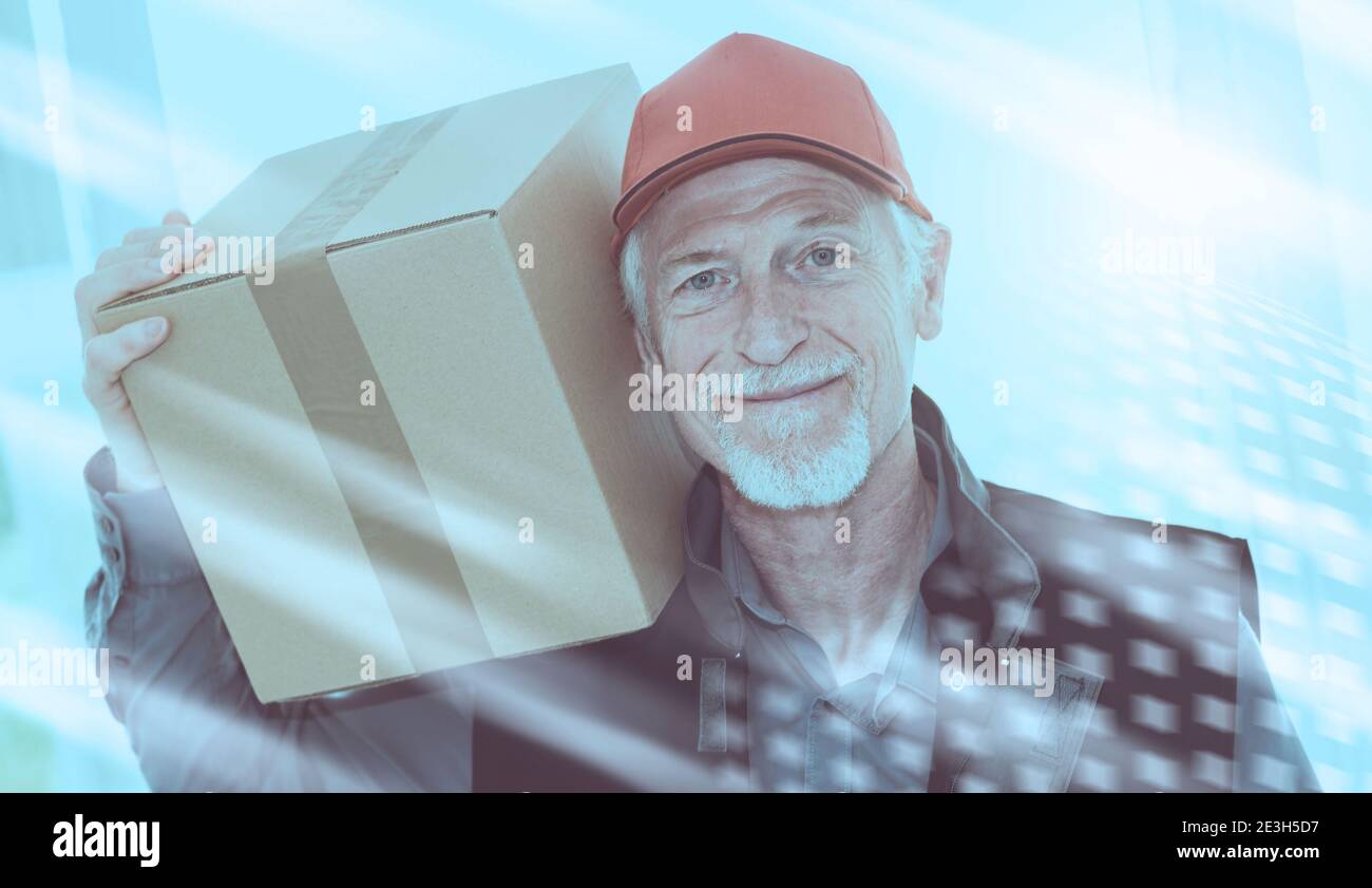 Portrait of smiling senior deliverer holding a package; light effect ...