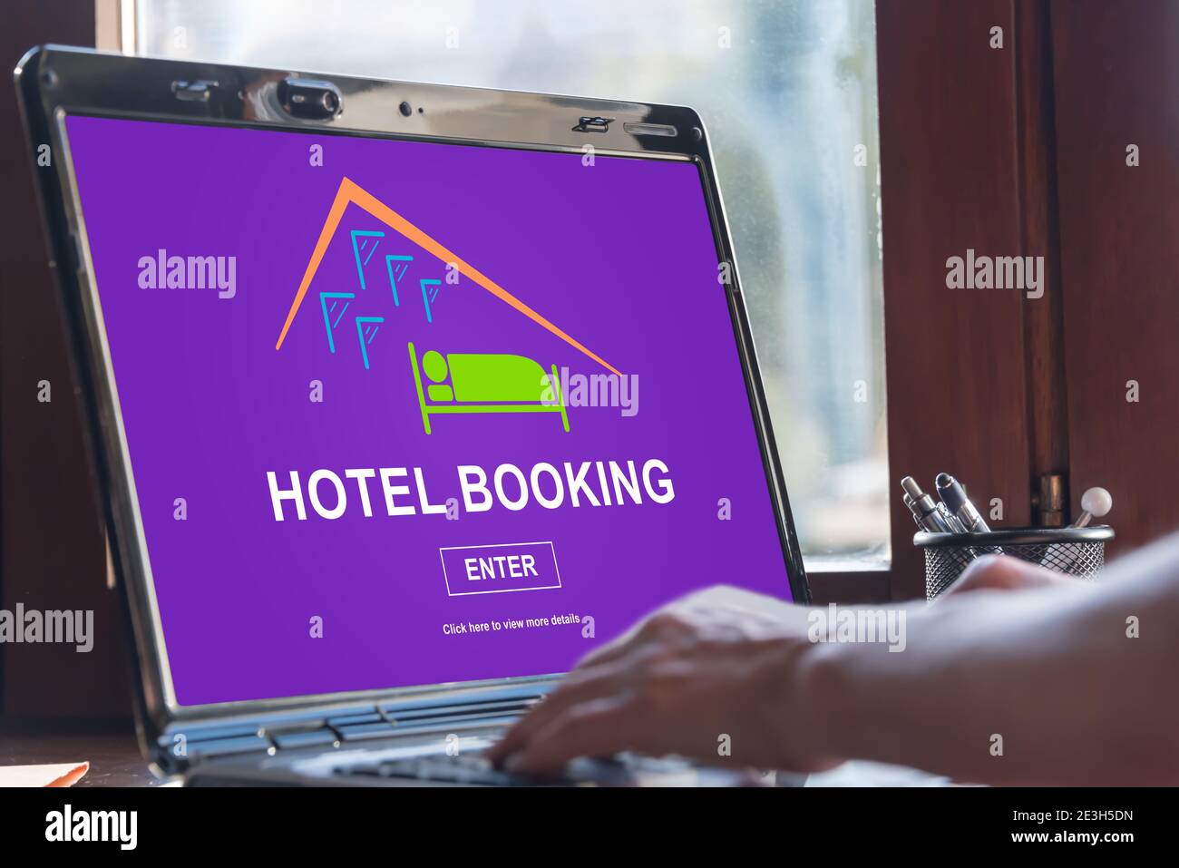 Laptop screen displaying a hotel booking concept Stock Photo - Alamy
