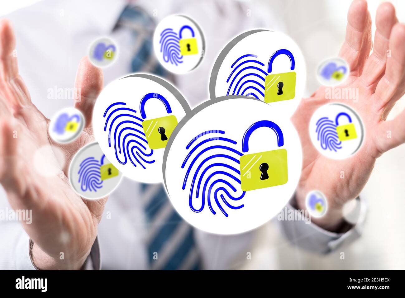 Fingerprint security system concept between hands of a man in ...