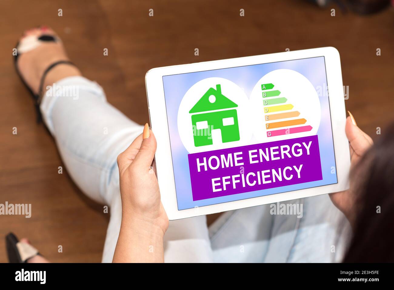 Tablet screen displaying a home energy efficiency concept Stock Photo ...