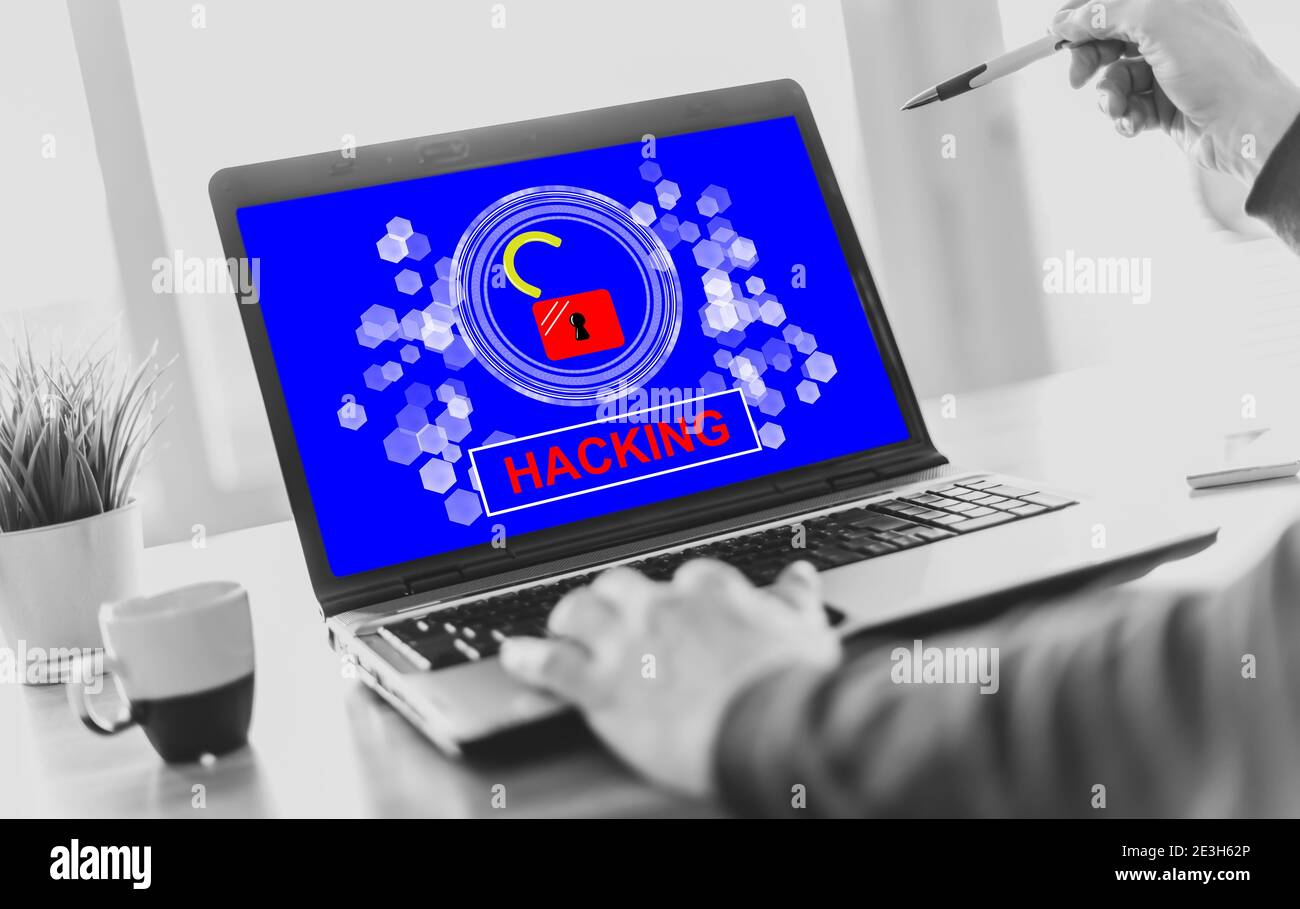 Laptop screen displaying a hacking concept Stock Photo - Alamy