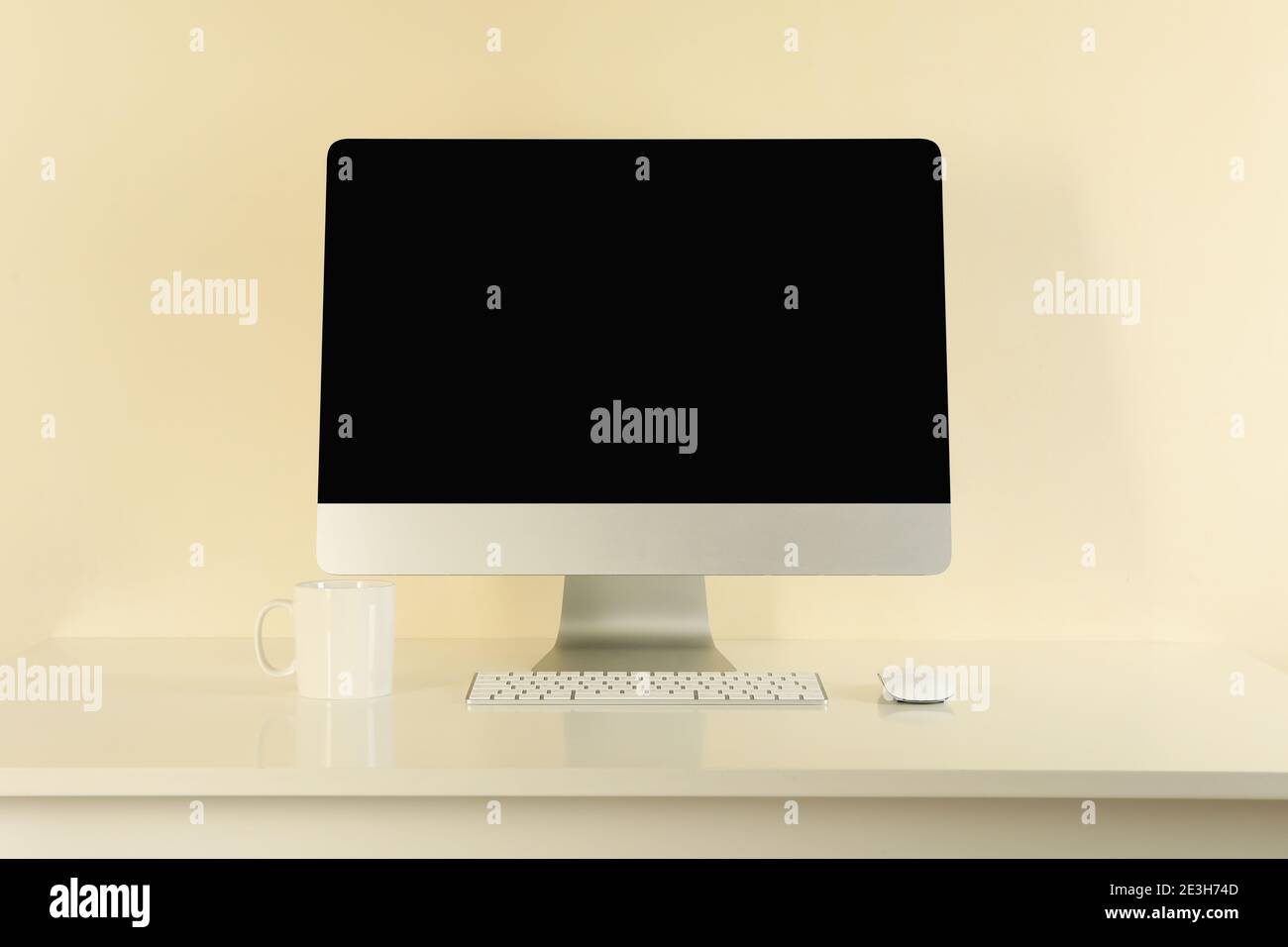 Minimalist workspace concept with desktop computer on beige background ...