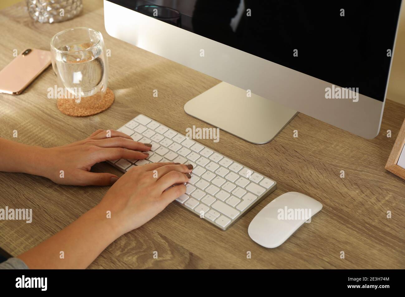 Woman working on desktop computer hi-res stock photography and images ...