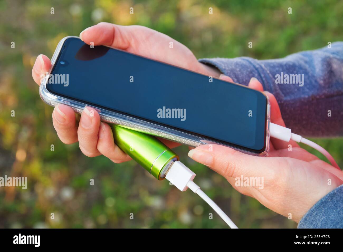 Girl uses smartphone green screen hi-res stock photography and images ...