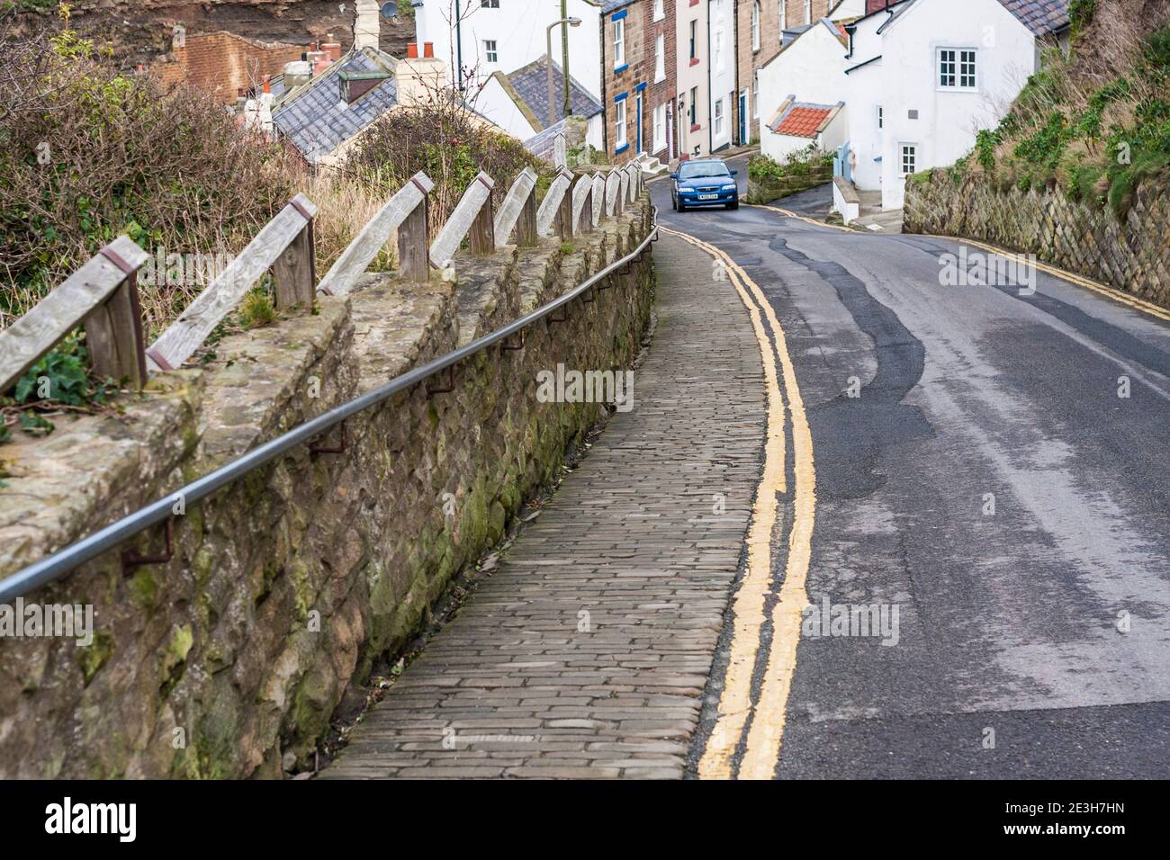 Car up steep hill hi-res stock photography and images - Alamy