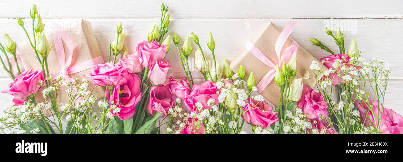 Beautiful spring flowers on white wooden background. Festive floral ...