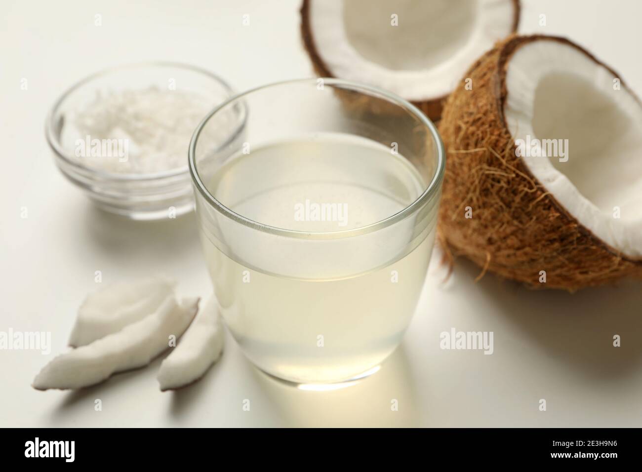 Fresh coconut and coconut milk on white background Stock Photo - Alamy