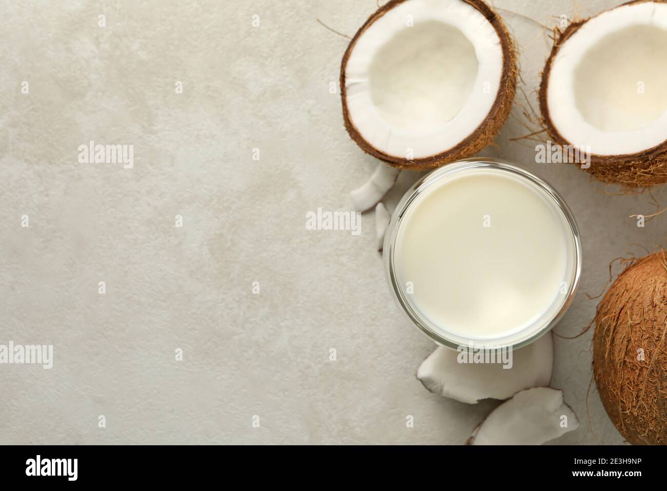 Fresh coconut and coconut milk on white background Stock Photo - Alamy