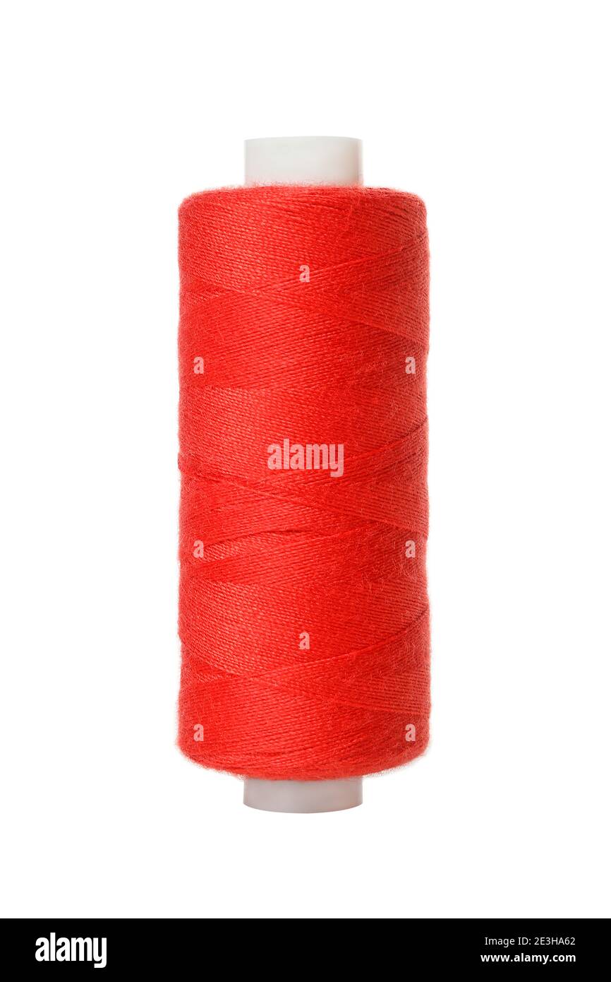 Red spool of thread isolated on white background Stock Photo - Alamy