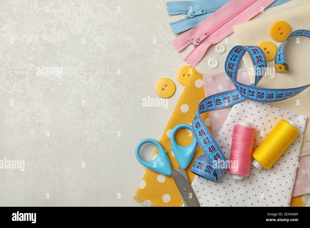 Sewing supplies on white background, space for text Stock Photo - Alamy