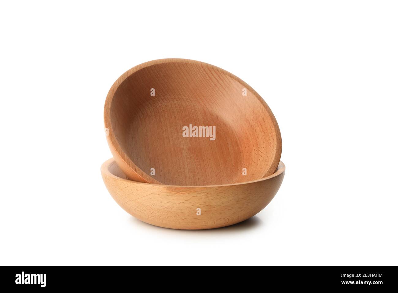 Two wooden bowls isolated on white background Stock Photo - Alamy