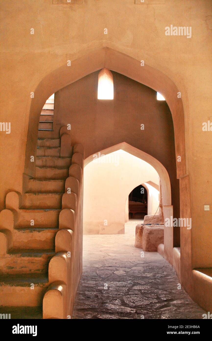Beatutiful entry arch to the historical Nizwa Fort, one of the oldest ...