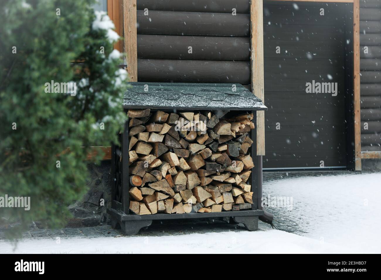 Snowfall in forest near house hi-res stock photography and images - Alamy