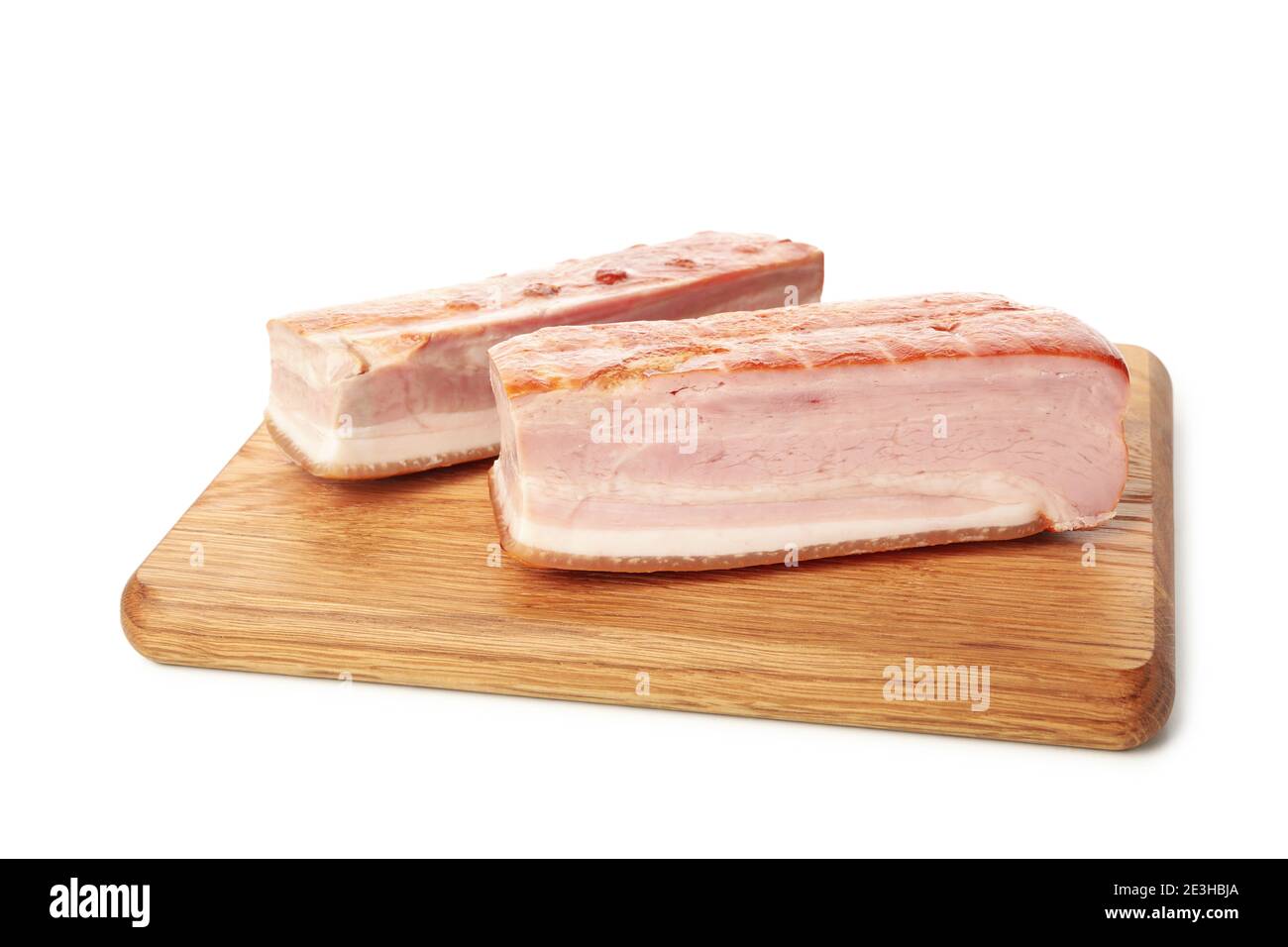 Board with tasty bacon isolated on white background Stock Photo - Alamy