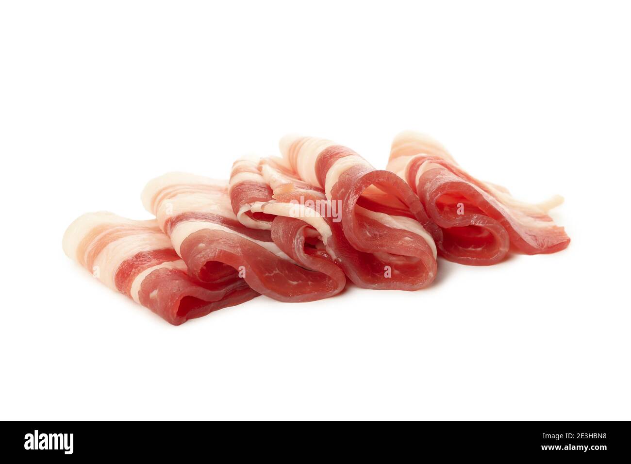 Tasty raw bacon isolated on white background Stock Photo - Alamy