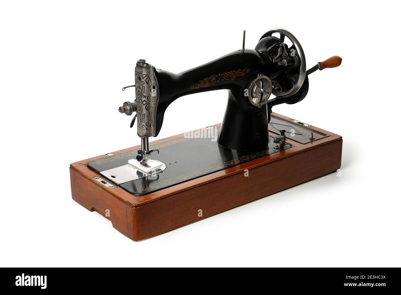 Old vintage sewing machine isolated on white background Stock Photo - Alamy