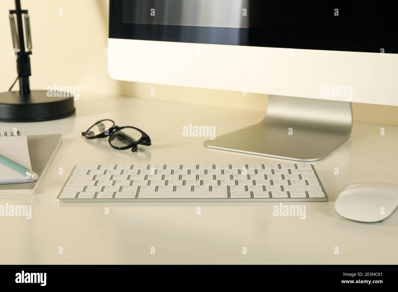 Concept of workplace with modern desktop computer on white table Stock ...