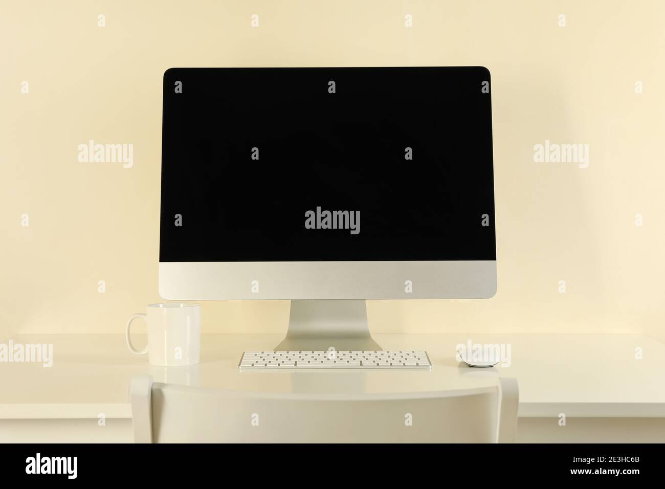 Minimalist workspace concept with desktop computer on beige background ...