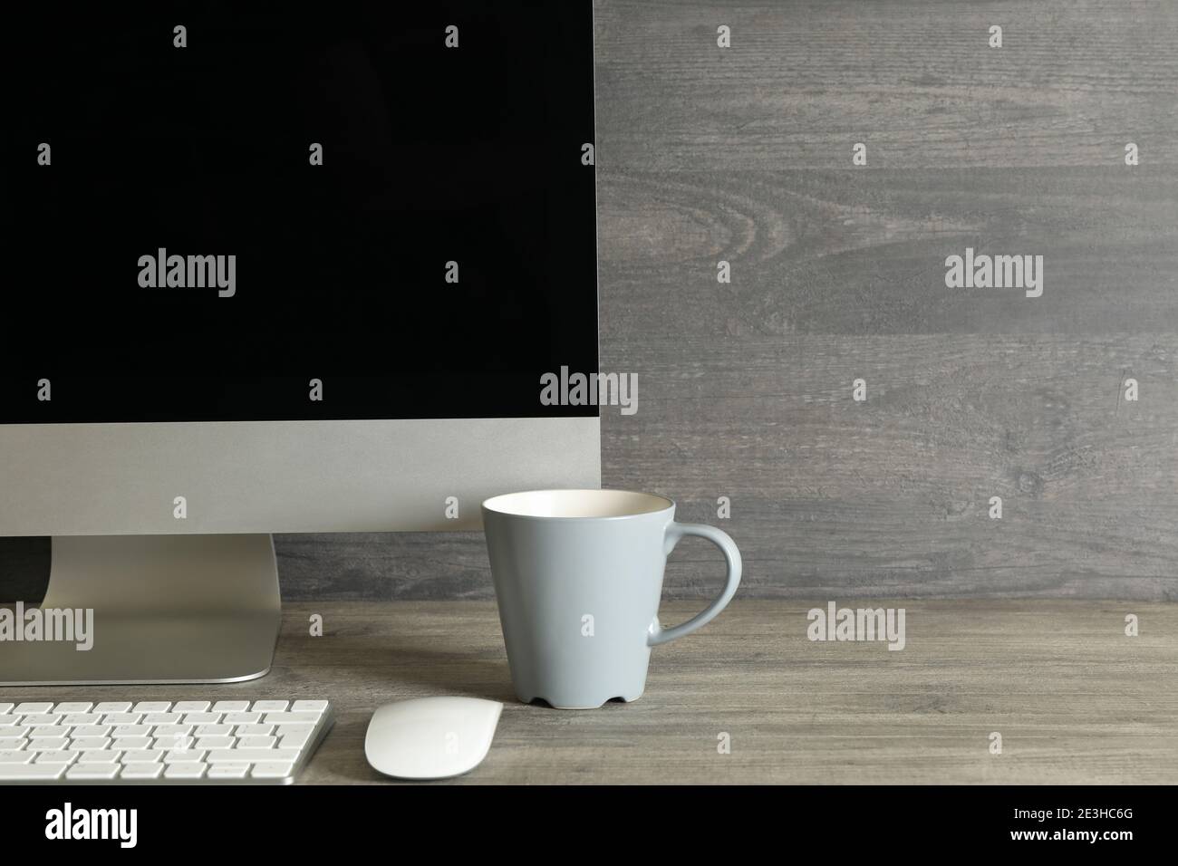 Minimalist workspace concept with desktop computer on gray background ...