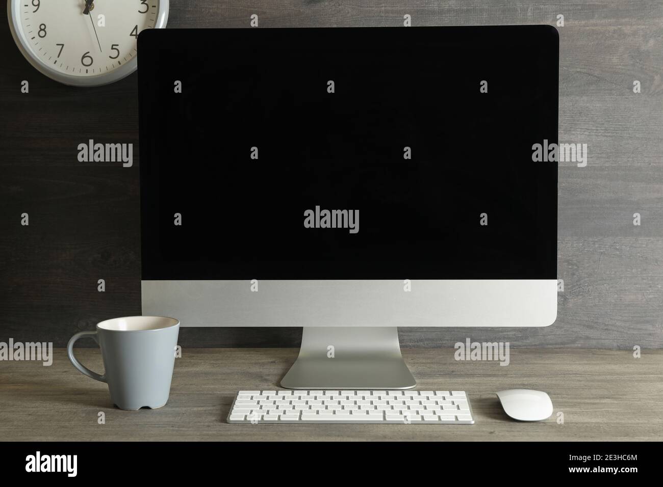 Minimalist workspace concept with desktop computer on gray background ...