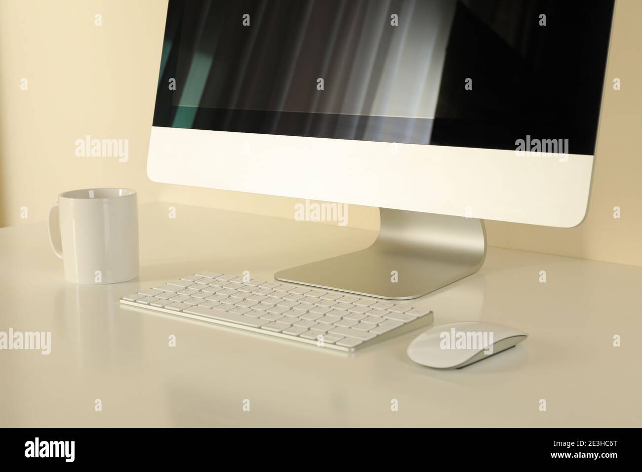 Minimalist workspace concept with desktop computer on beige background ...